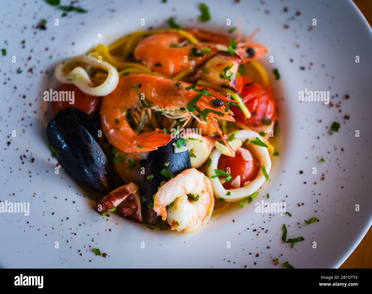 delicious italian spaghetti with fresh sea food & spices Stock Photo ...