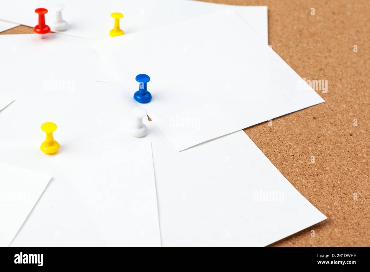 white memo stick on board. Creative photo Stock Photo - Alamy