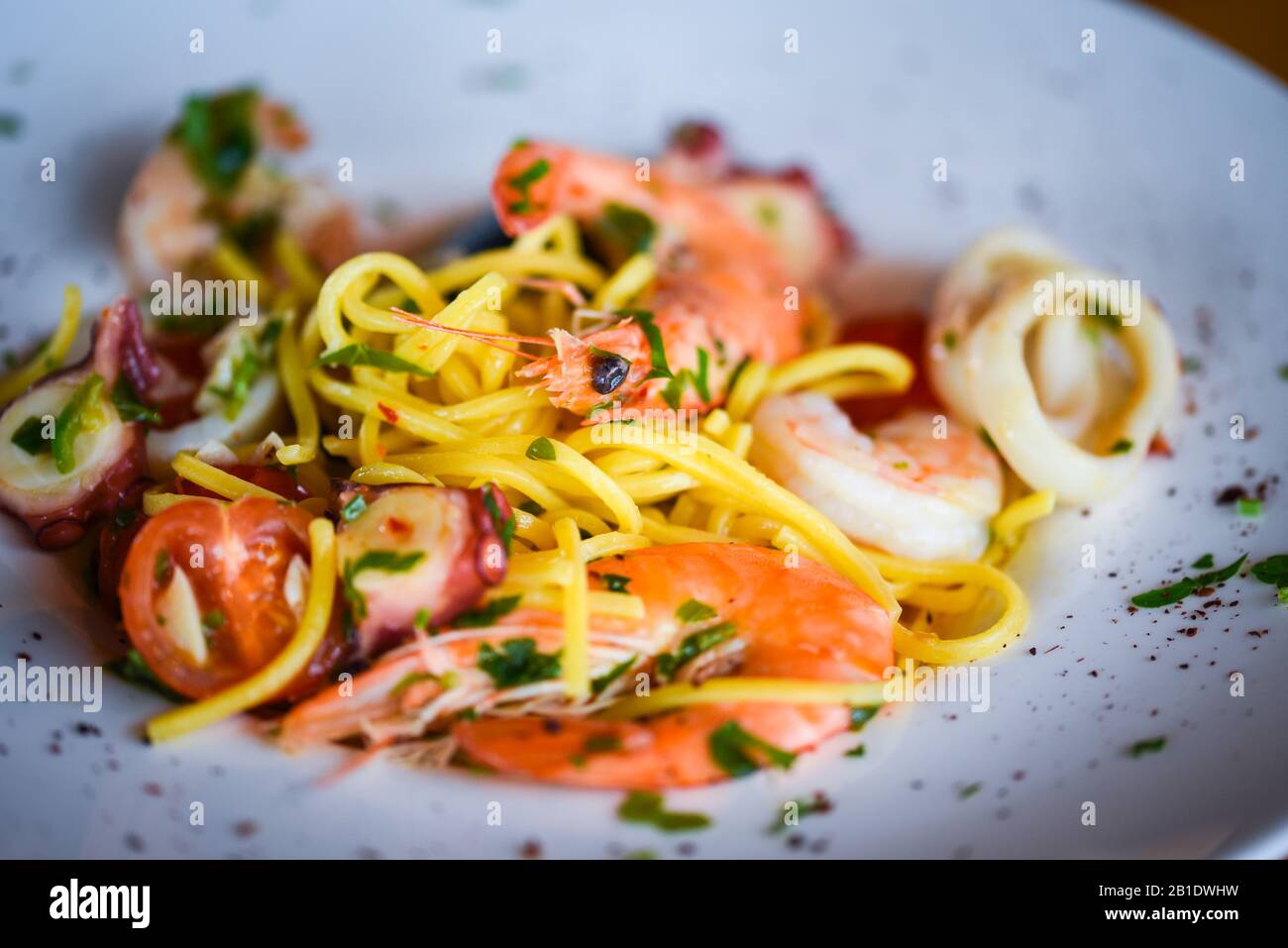 delicious italian spaghetti with fresh sea food & spices Stock Photo ...