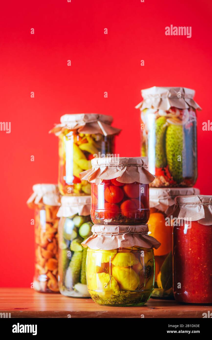 Preserved and fermented food in glass jars. Fermented food. Autumn ...