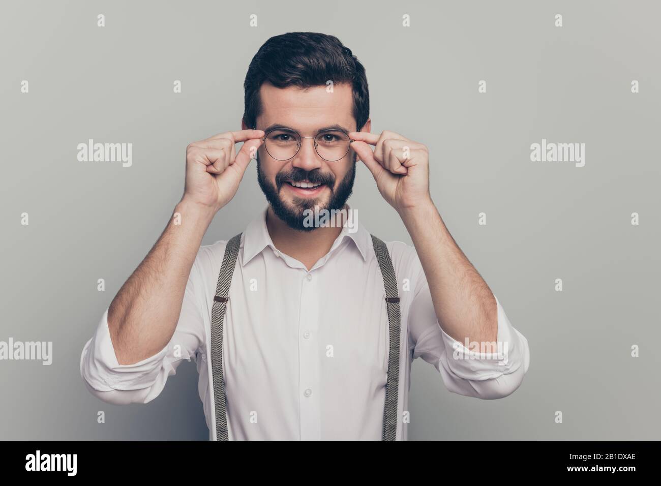 Portrait of cheerful optimistic rich wealthy company owner man touch ...