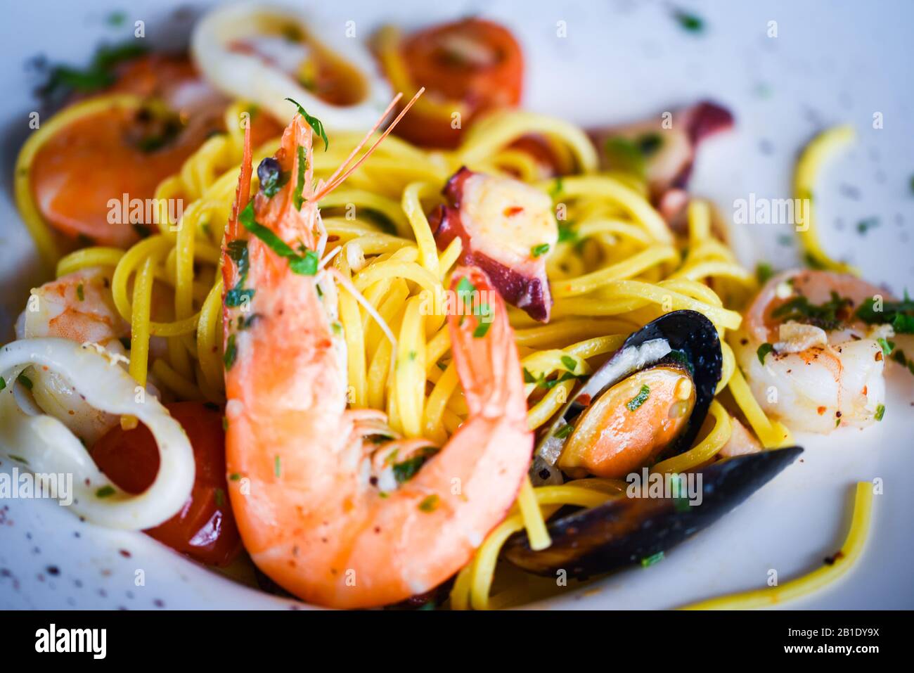 delicious italian spaghetti with fresh sea food & spices Stock Photo ...