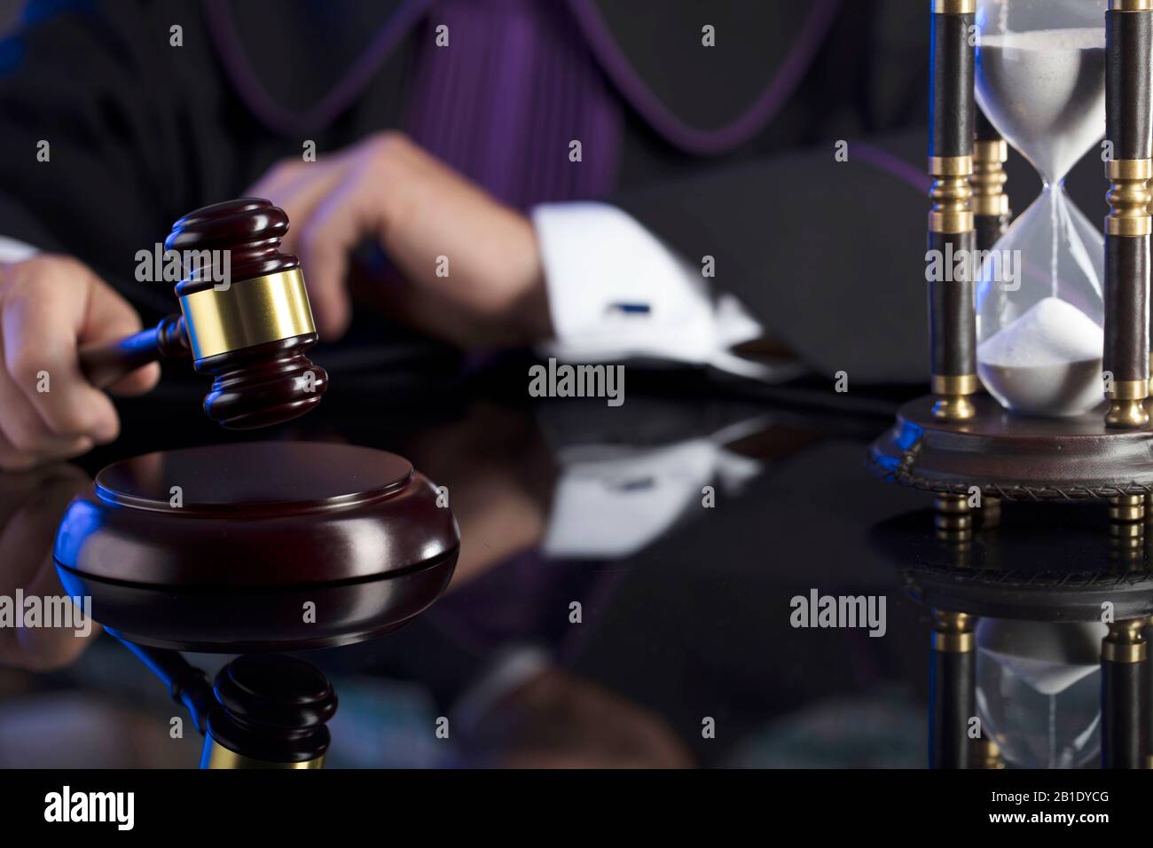 Law and justice theme. Jjudge in toga with the gavel during the trial ...