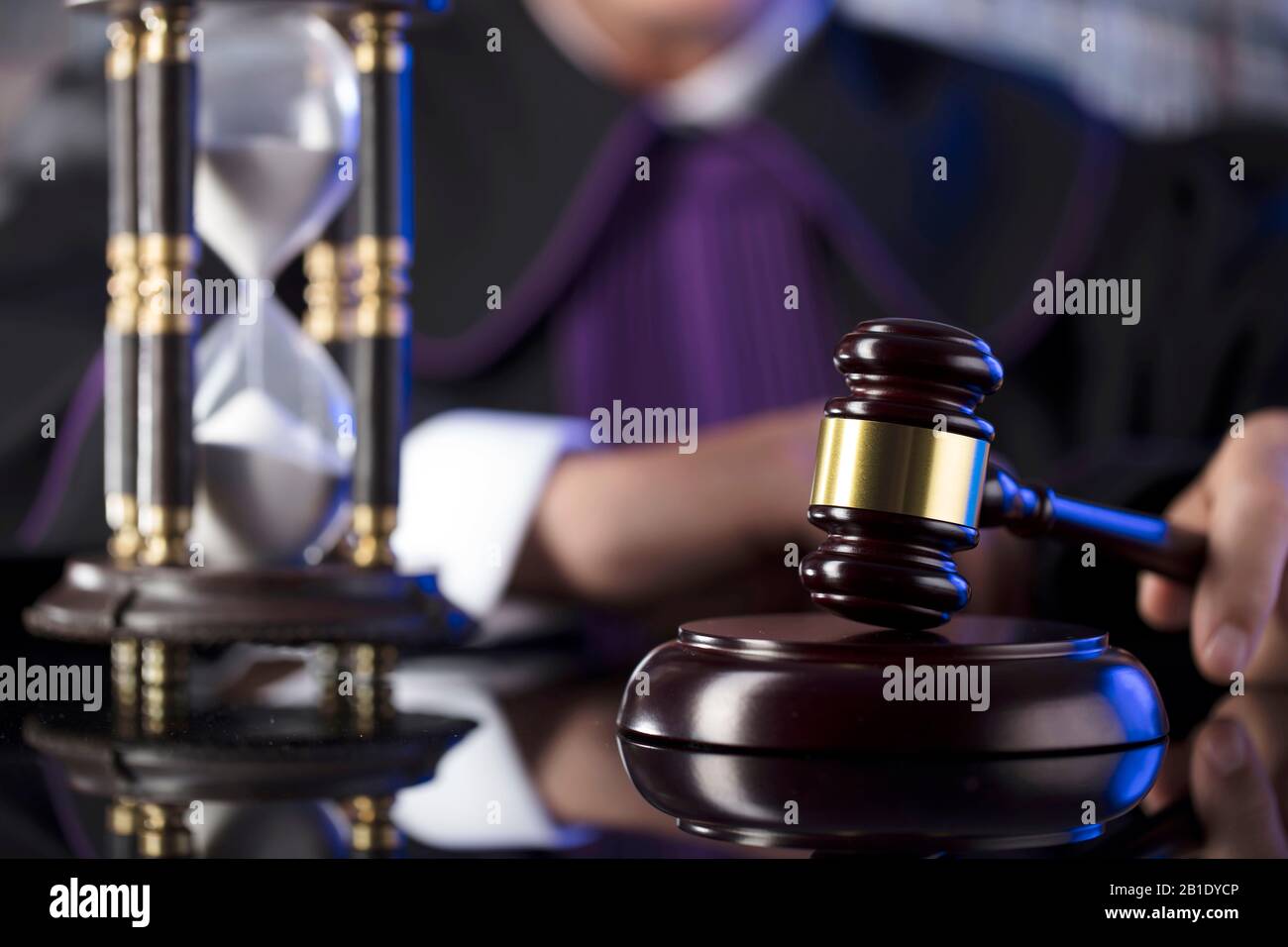 Law and justice theme. Jjudge in toga with the gavel during the trial ...