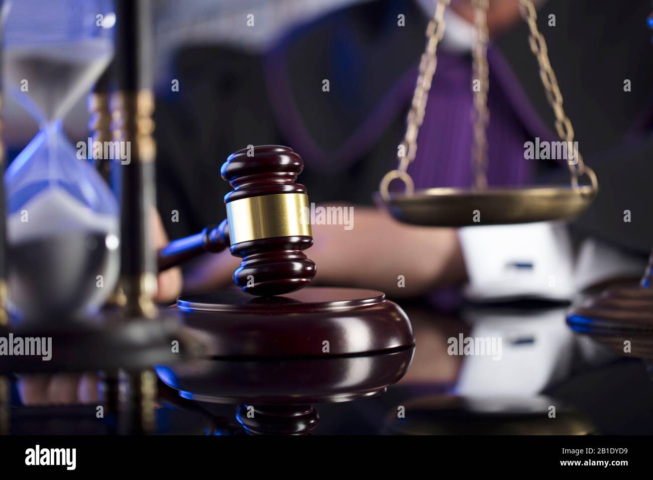 Law and justice theme. Jjudge in toga with the gavel during the trial ...