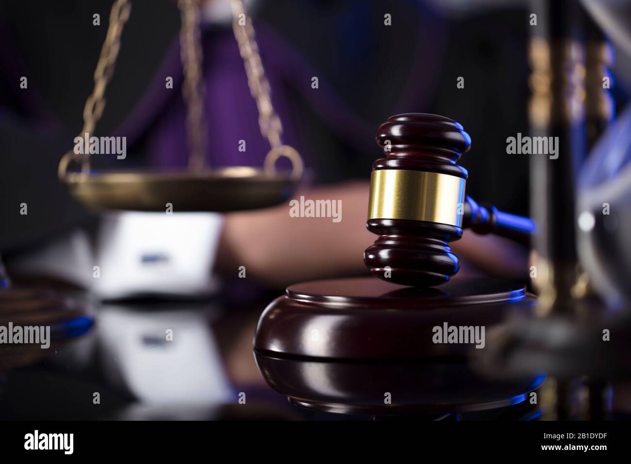 Law and justice theme. Jjudge in toga with the gavel during the trial ...