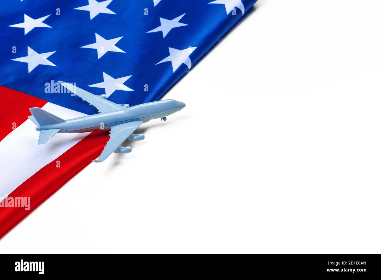 Plastic toy jet plane and flag of USA Stock Photo - Alamy