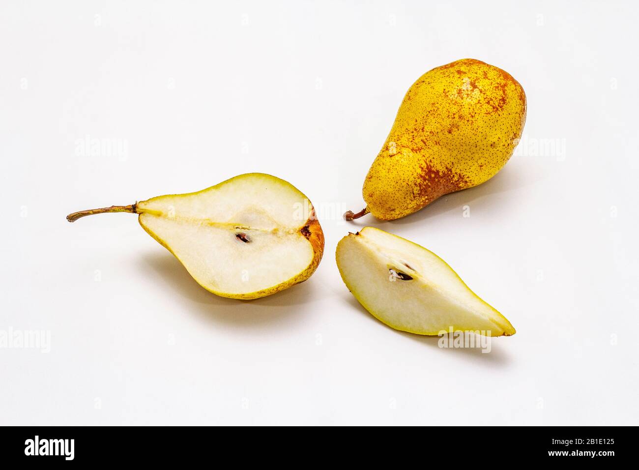 Ripe single pear. Fresh whole fruit, half sliced, seeds. Isolated on ...