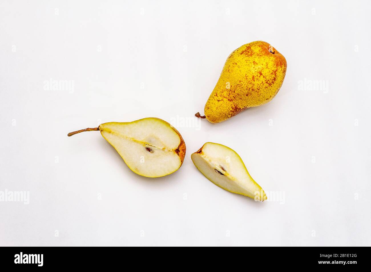 Ripe single pear. Fresh whole fruit, half sliced, seeds. Isolated on ...