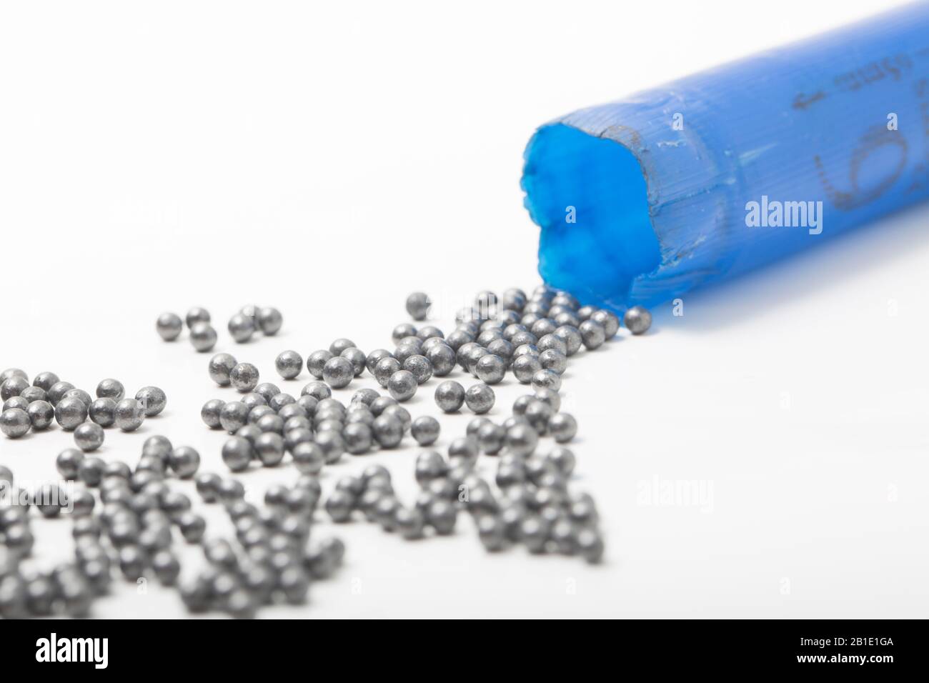 A fired/empty 16-bore, or gauge, plastic shotgun cartridge with lead ...