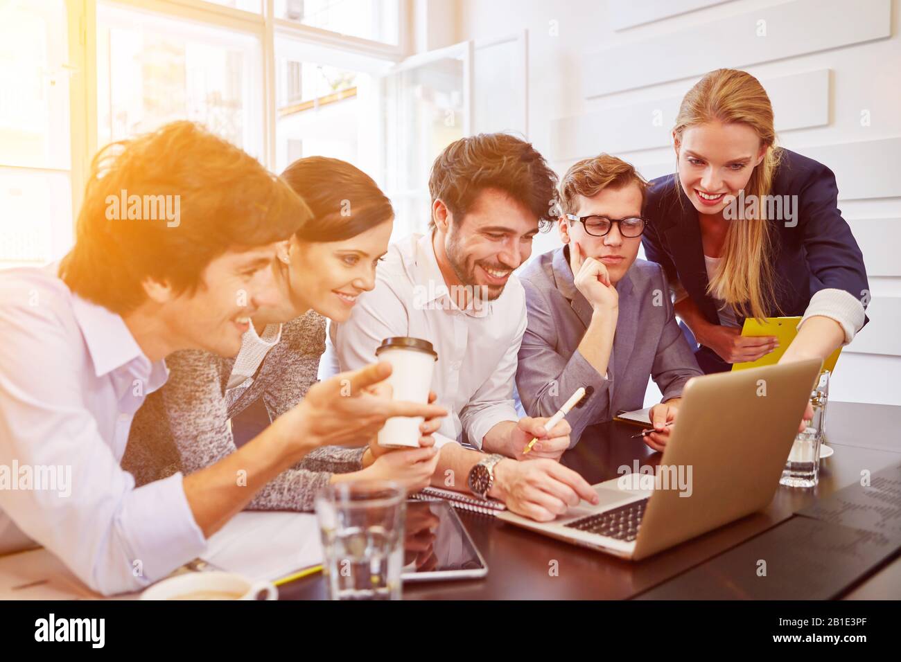 Business team during a training session on a computer in the office ...