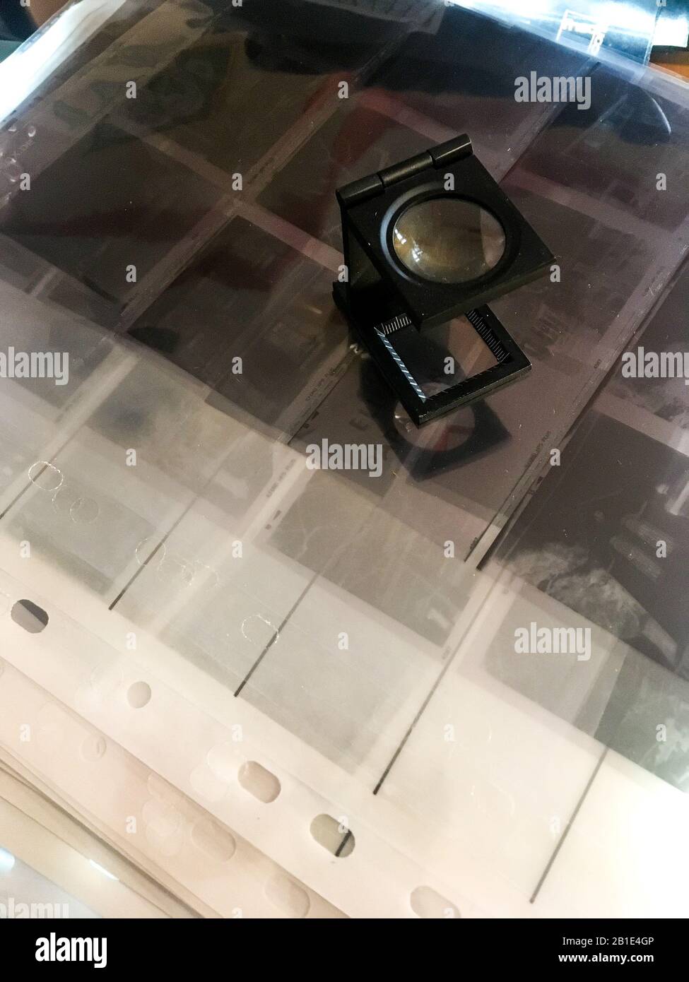 Negatives magnifying glass hi-res stock photography and images - Alamy