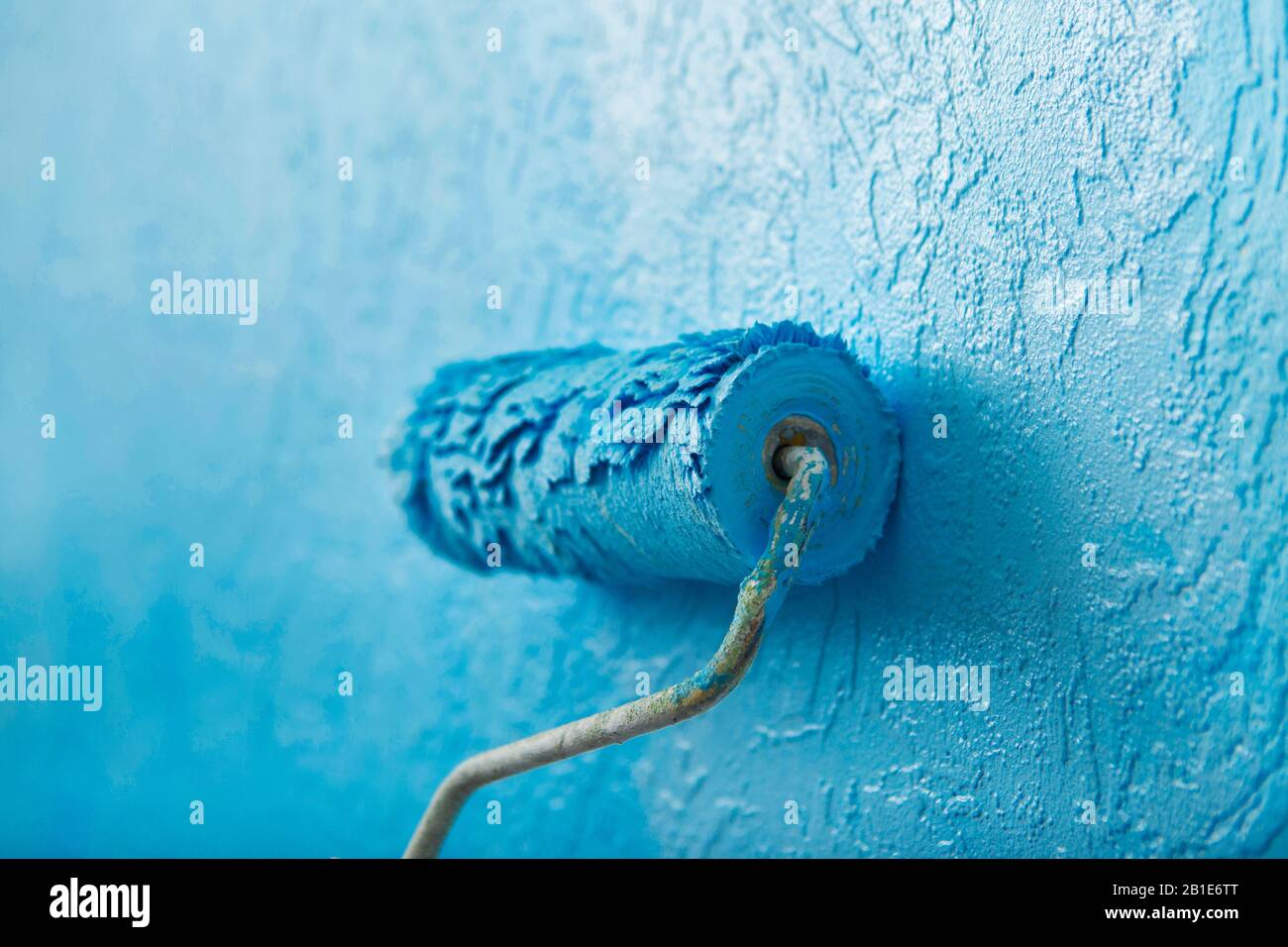 Roller Colors wall texture in blue color Stock Photo - Alamy