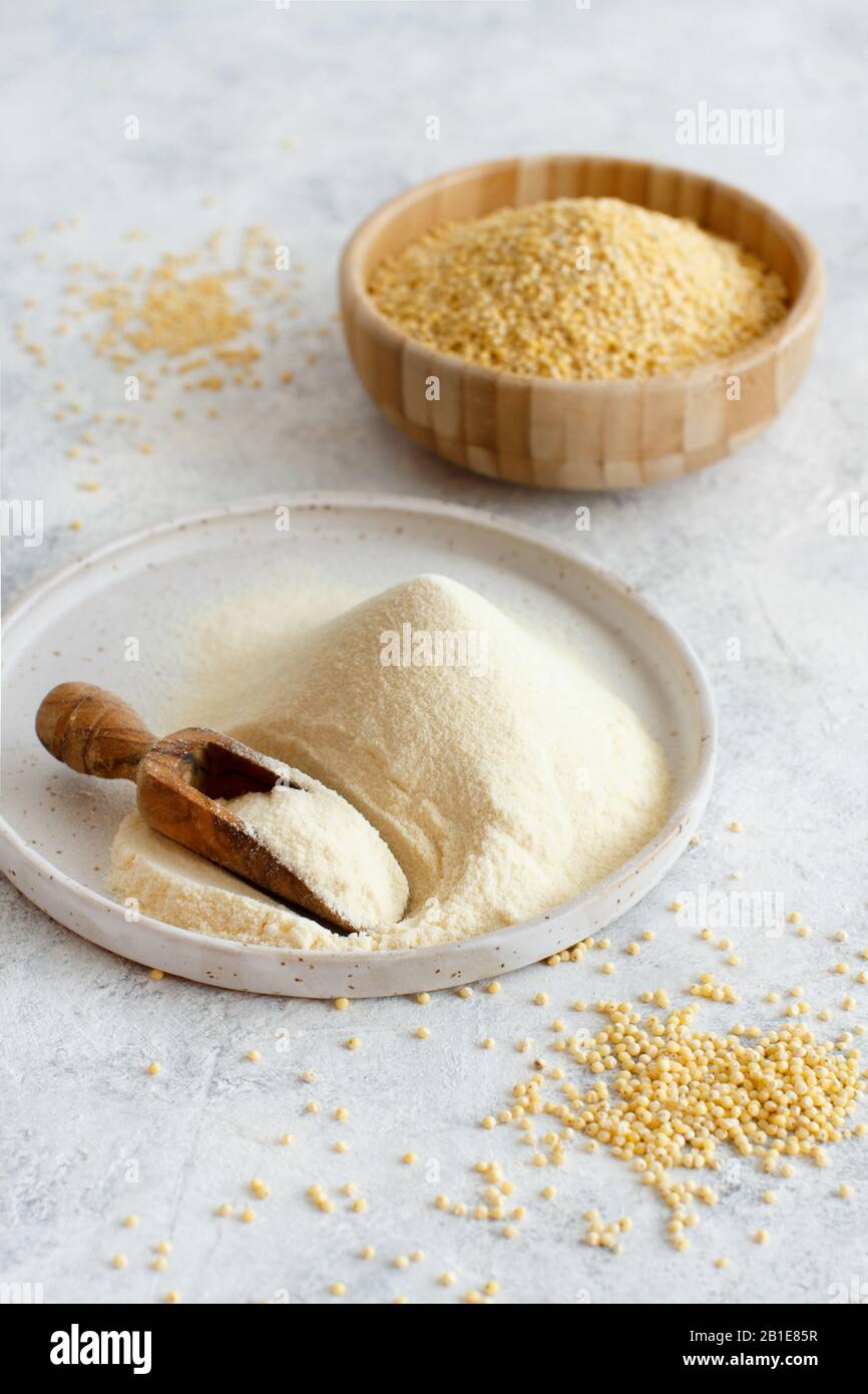 Hulled millet flour and grain close up Stock Photo - Alamy