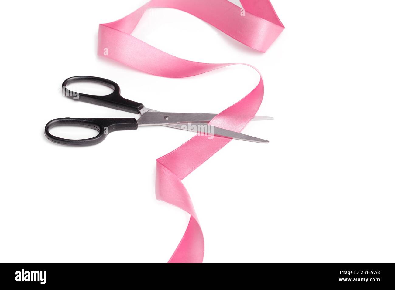ribbon with scissors isolated on white. creative photo Stock Photo - Alamy