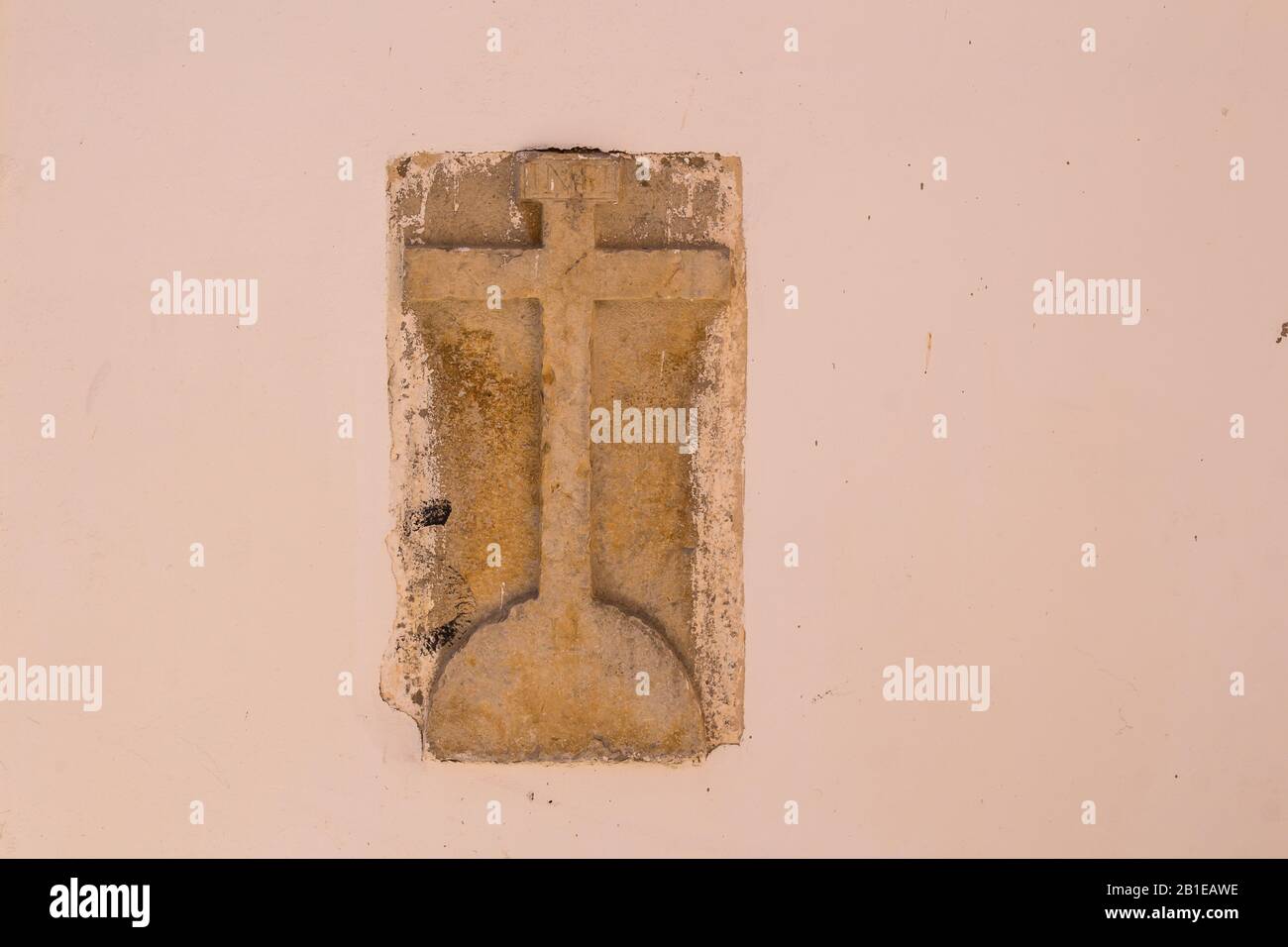 Old stone cross with letters INRI (Iesus Nazarenus Rex Iudaeorum ...