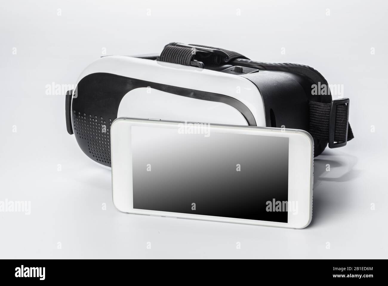 VR Glasses and smartphone isolated on white background Stock Photo - Alamy