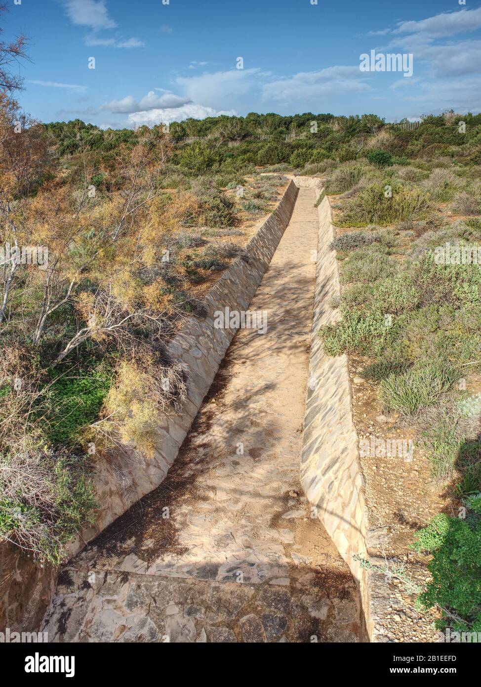 Close up of dry concrete drained channel, deep long lines. Empty ...