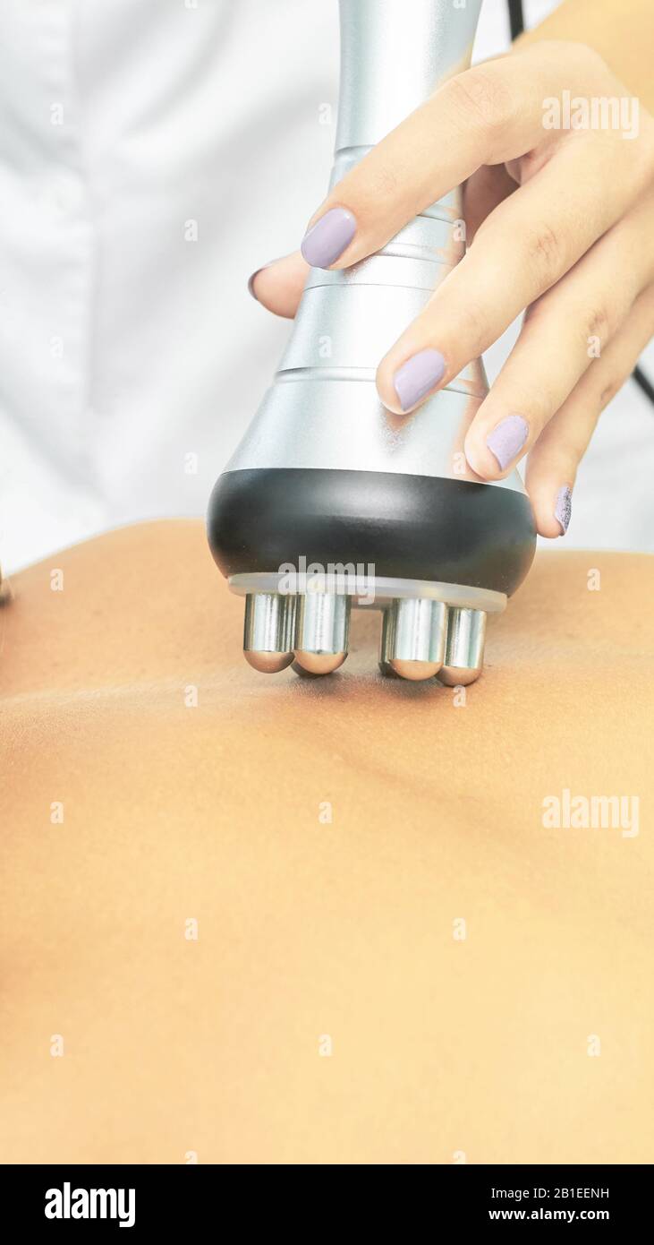Perfect body radio treatment. Woman at spa procedure. Doctor hand, girl ...
