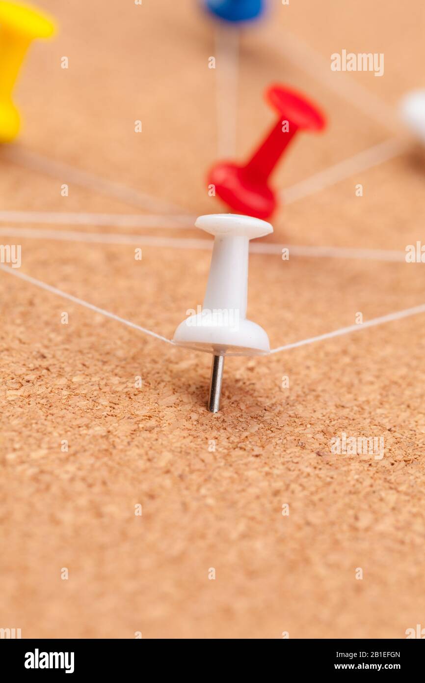 pins connected creating a network. creative photo Stock Photo - Alamy