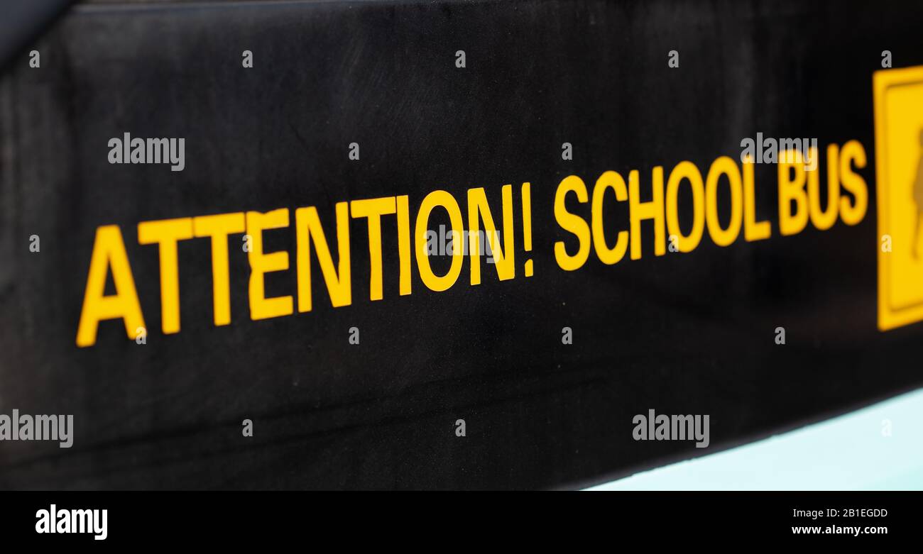 Signs on a school bus for kids safety Stock Photo - Alamy