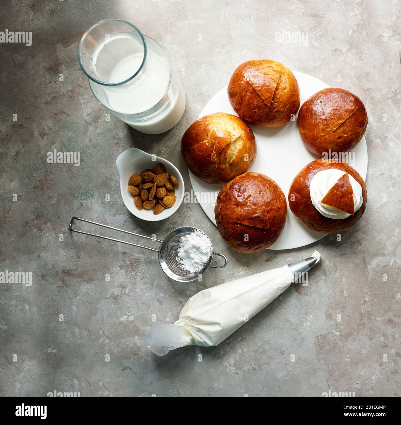 Semla or semlor, vastlakukkel, laskiaispulla is a traditional sweet ...