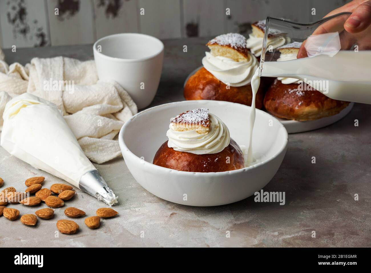 Semla or semlor, vastlakukkel, laskiaispulla is a traditional sweet ...