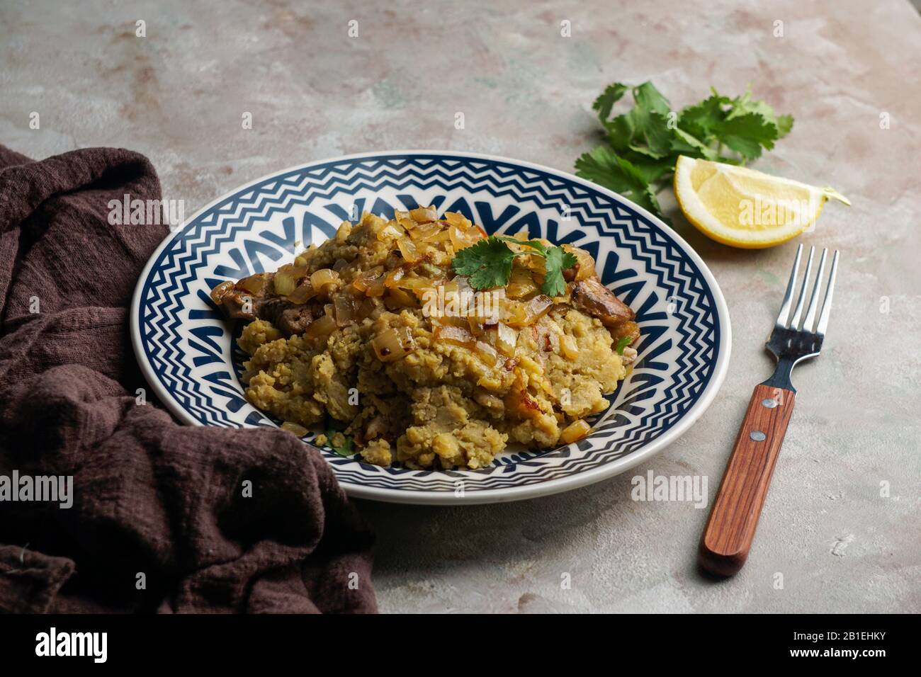 Mofongo, mashed boiled plantains with porc meat, onion. Puerto Rico ...