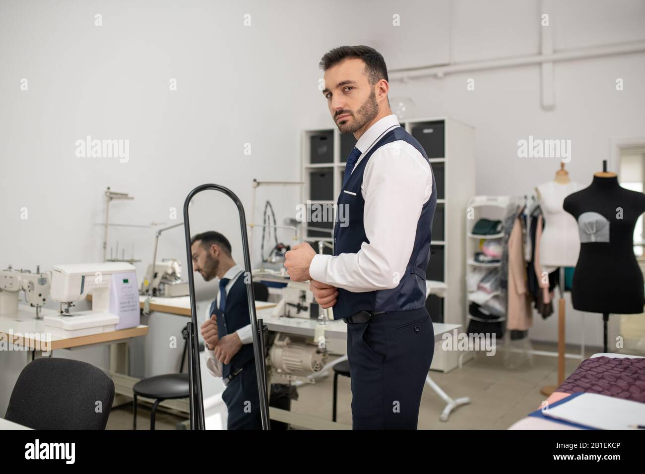 Man adjusting cuffs hi-res stock photography and images - Alamy