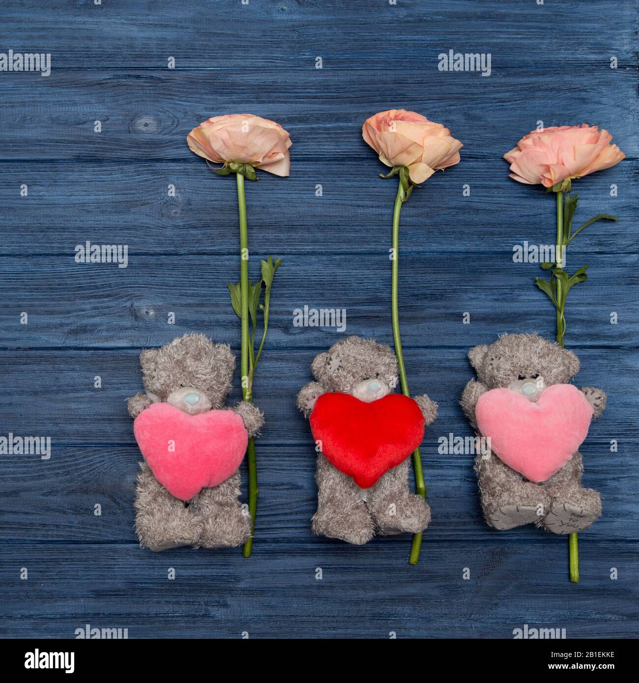 Bear with bunch of hearts flowers hi-res stock photography and images ...