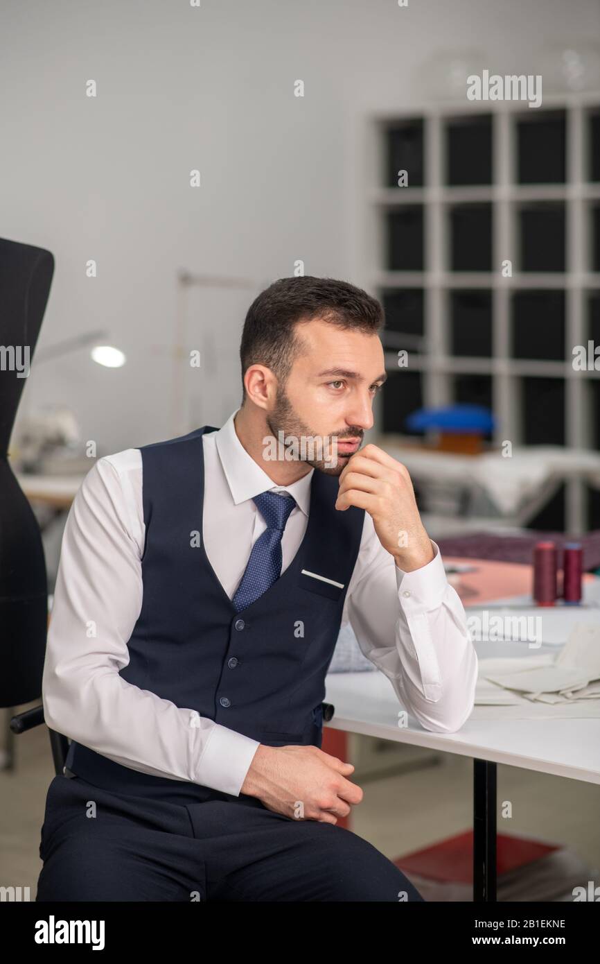 Propping chin with hand hi-res stock photography and images - Alamy