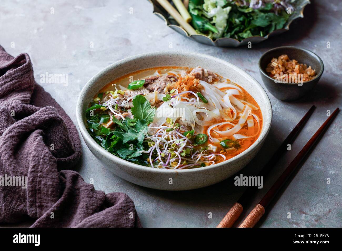 Bun Bo Hue, Bun Bo, Vietnamese beef noodle soup spicy. bowl of beef and ...