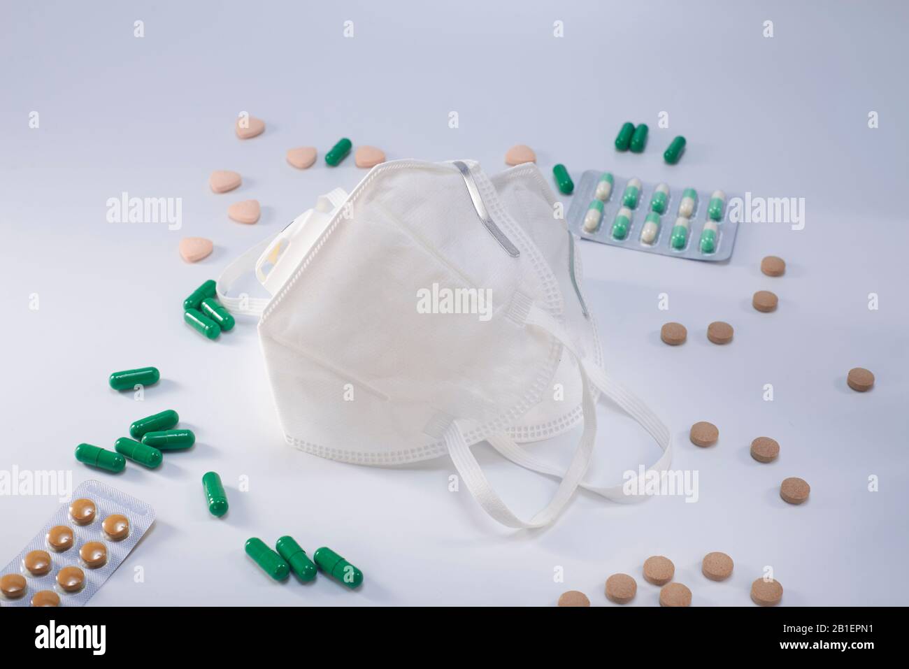 Two N95 antibacterial protective masks and a pile of therapeutic ...