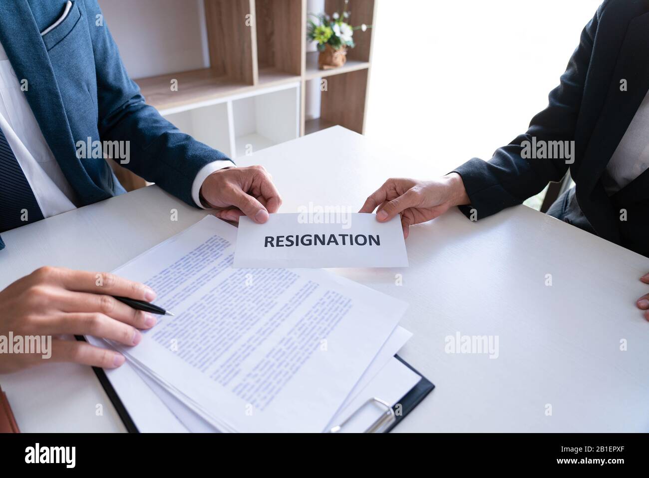 Employee businessman submit or sending resignation document letter to ...