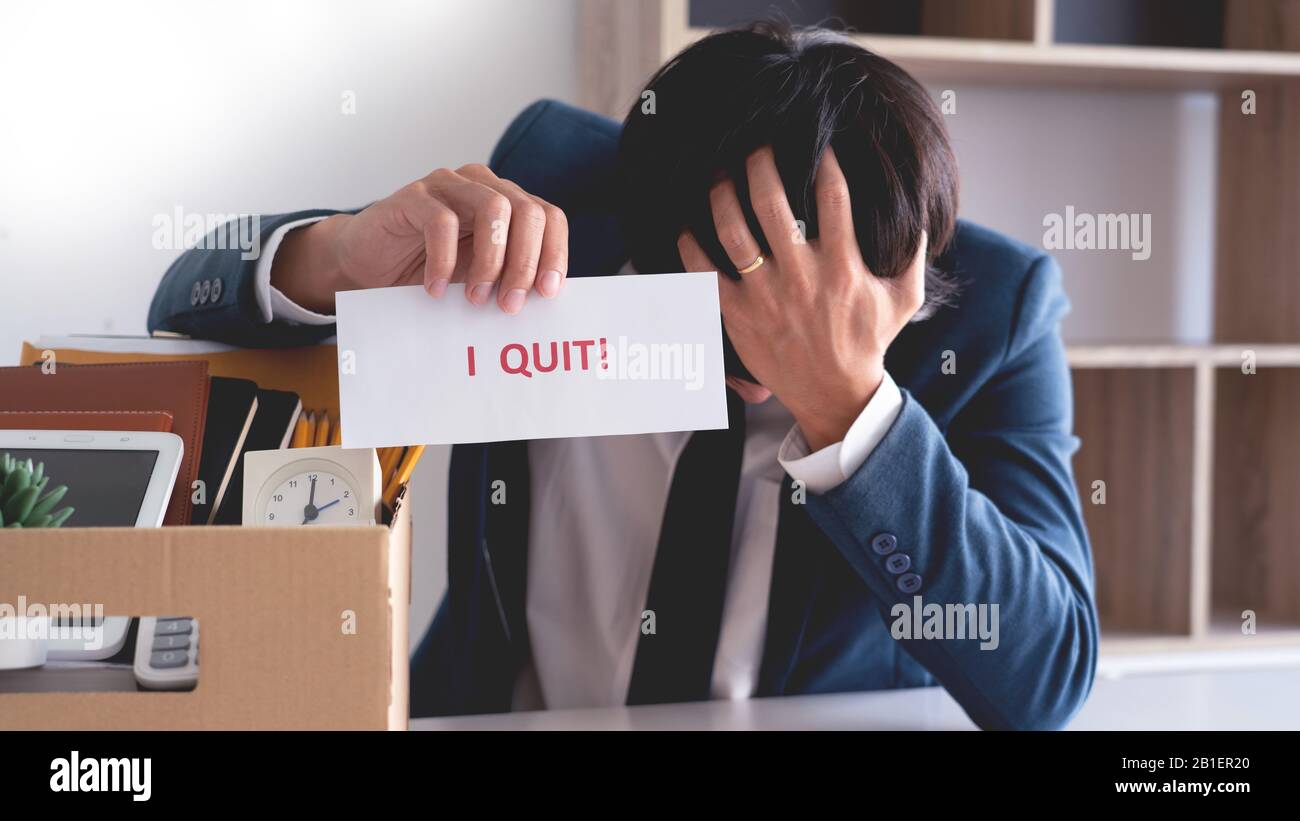 Businessman holding with I quit words card letter, resign employee ...