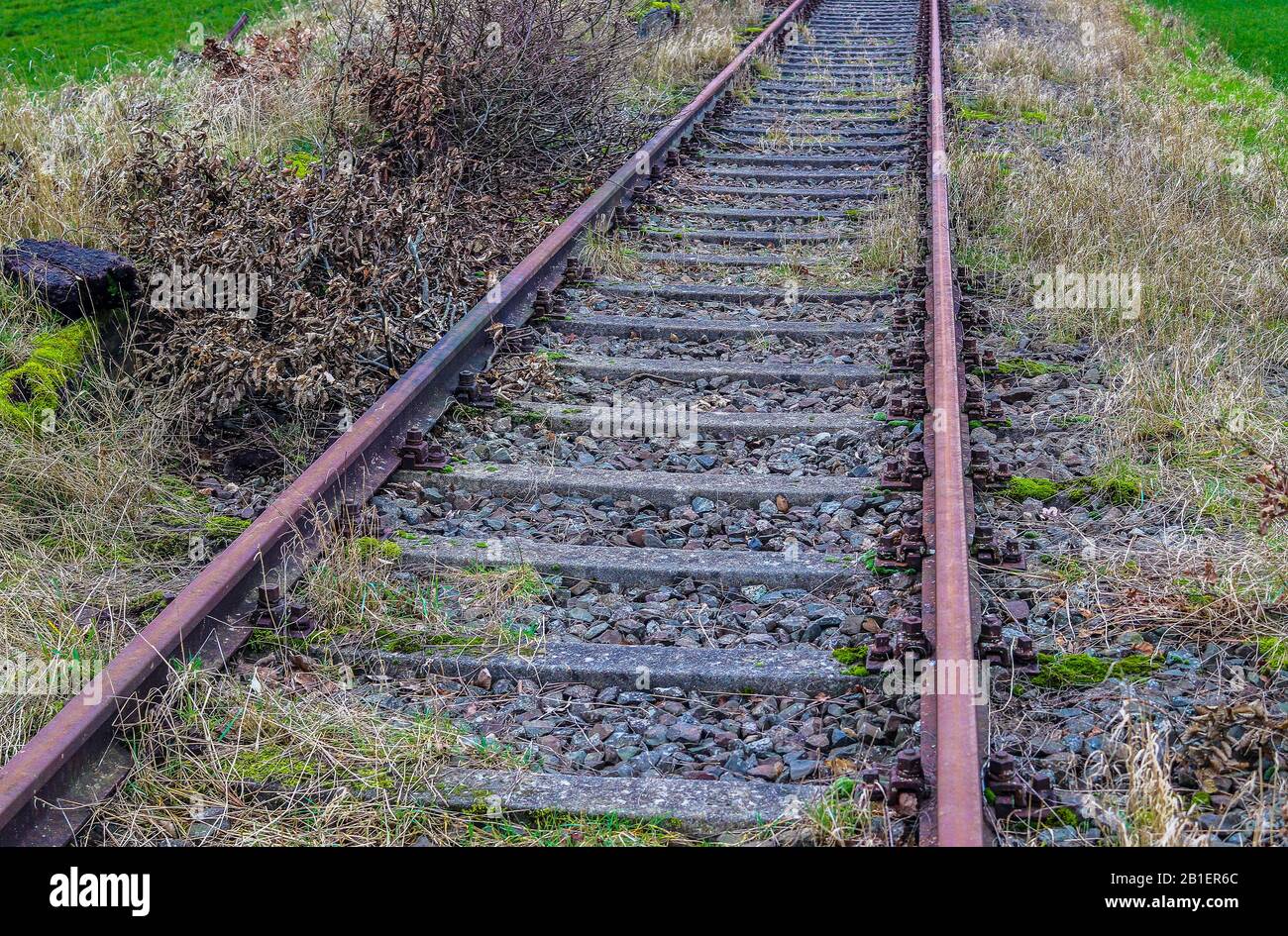 Old and abandoned railroad tracks in a nothern european environment ...