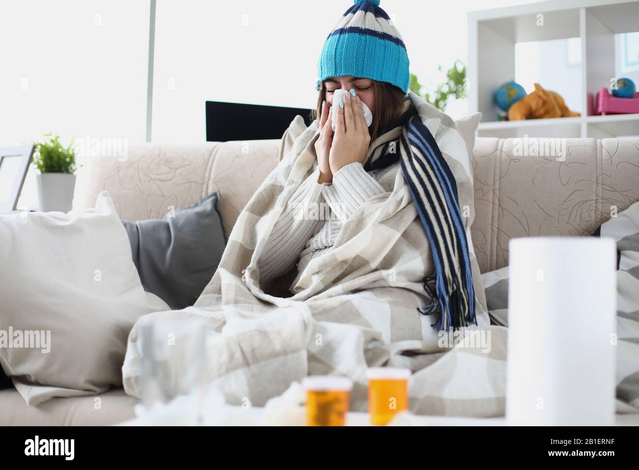 Lady trying to keep warm Stock Photo - Alamy