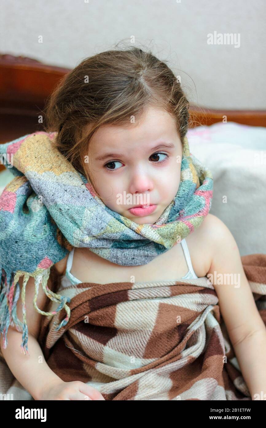 Little kid girl with cold sickness in a bed Stock Photo - Alamy
