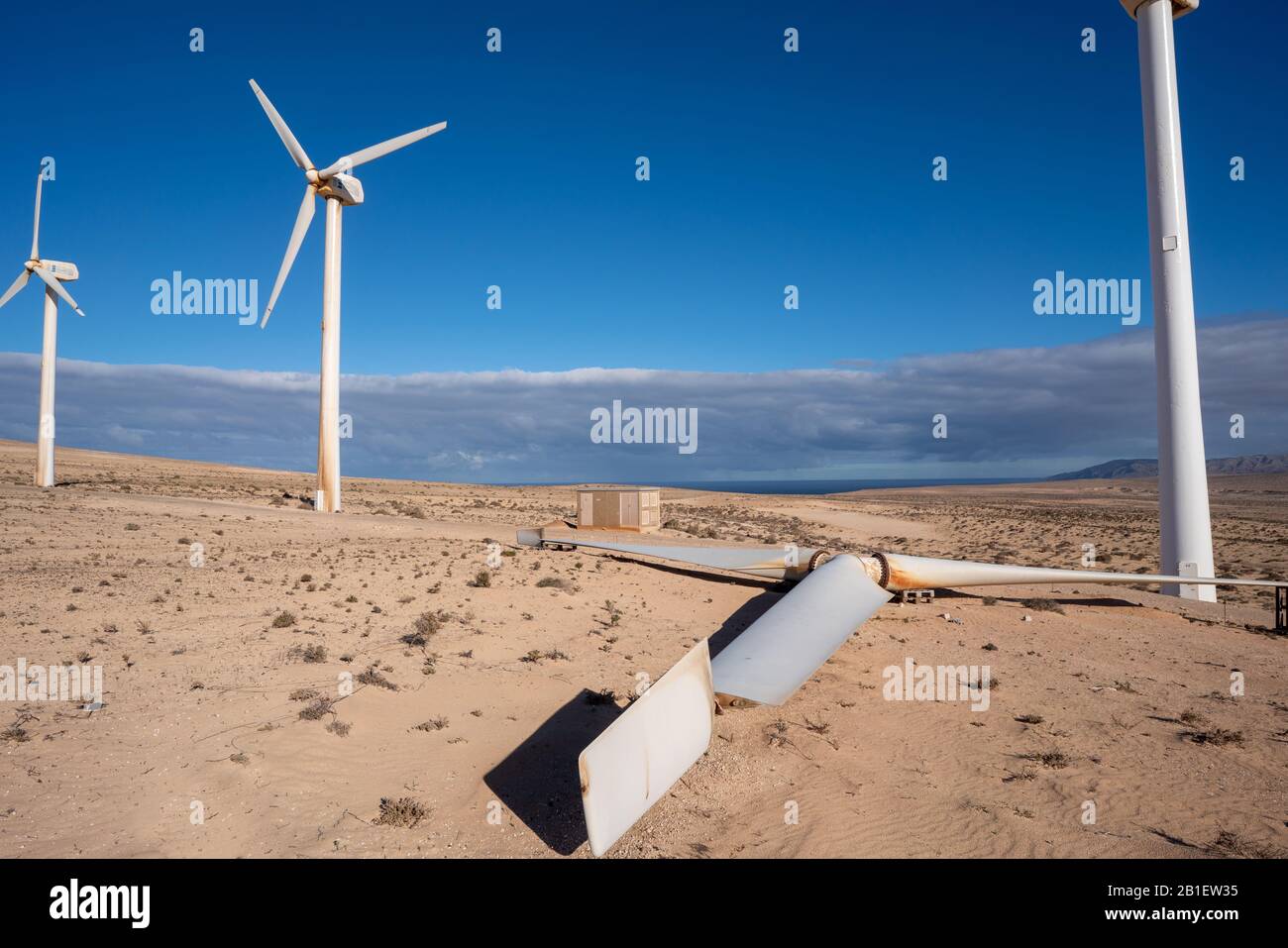 wind turbine in the desert with blue sky background. wind mill farm in ...