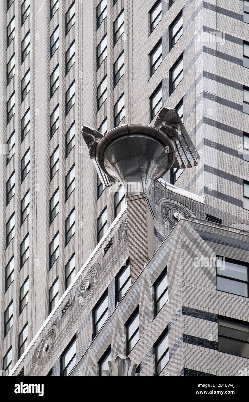 Detail of the Art Deco crown and spire of Chrysler Building in Midtown ...