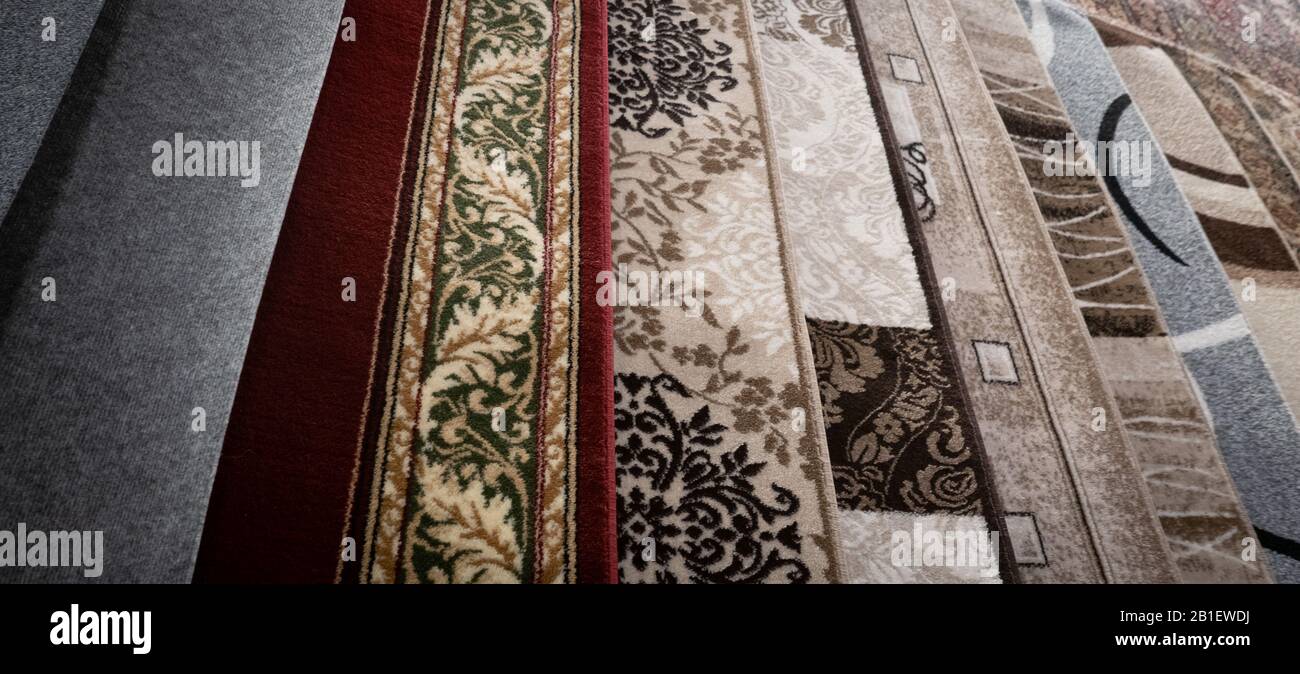 Lot of different carpets in a construction mall Stock Photo - Alamy
