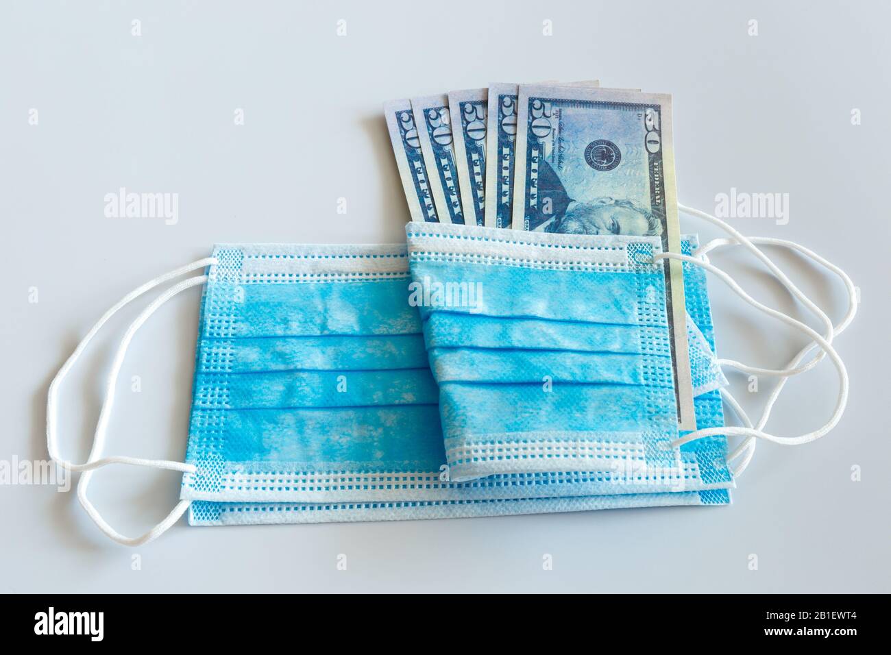 Medical masks and 50 dollars bills as a symbol of higher prices for ...