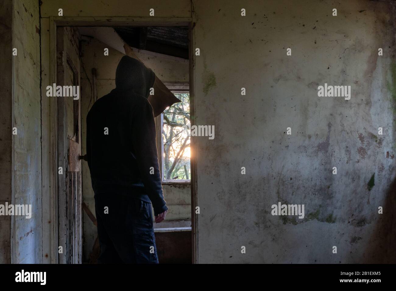 Silhouette house man standing in hi-res stock photography and images ...