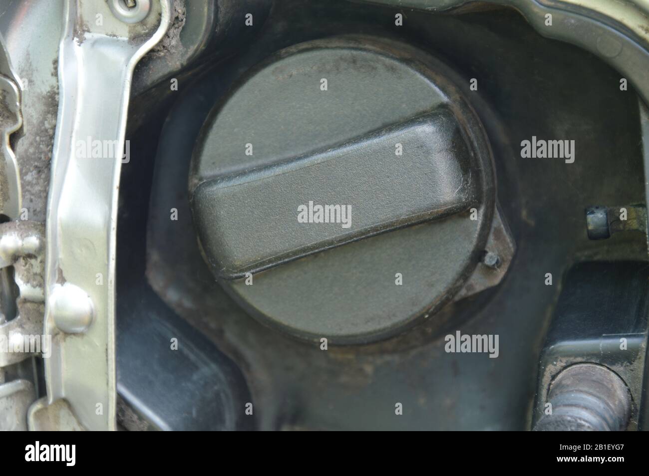 car fuel tank cap opened in parking Stock Photo - Alamy