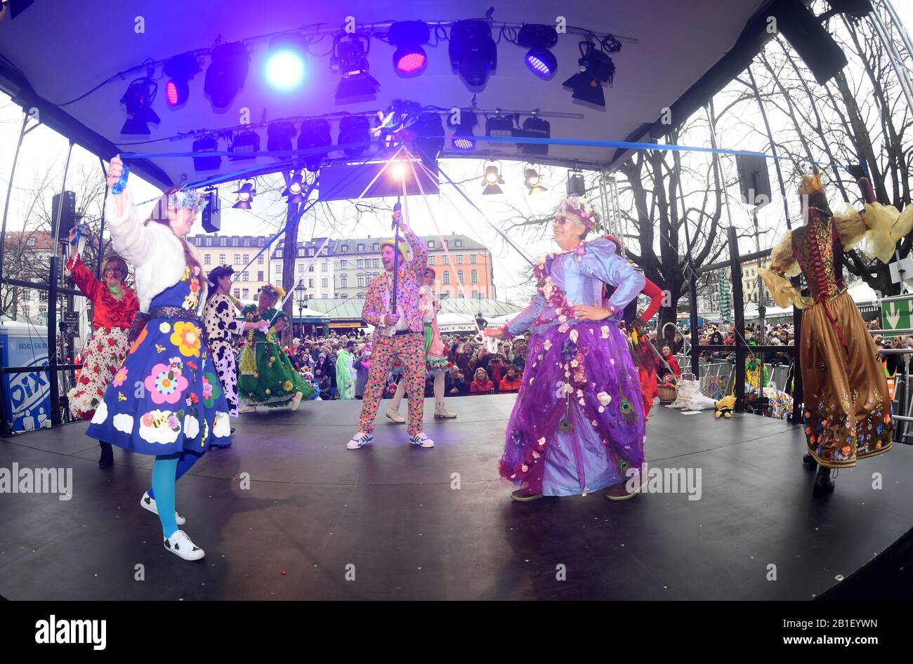 Munich, Germany. 25th Feb, 2020. Market women dance on a stage on ...