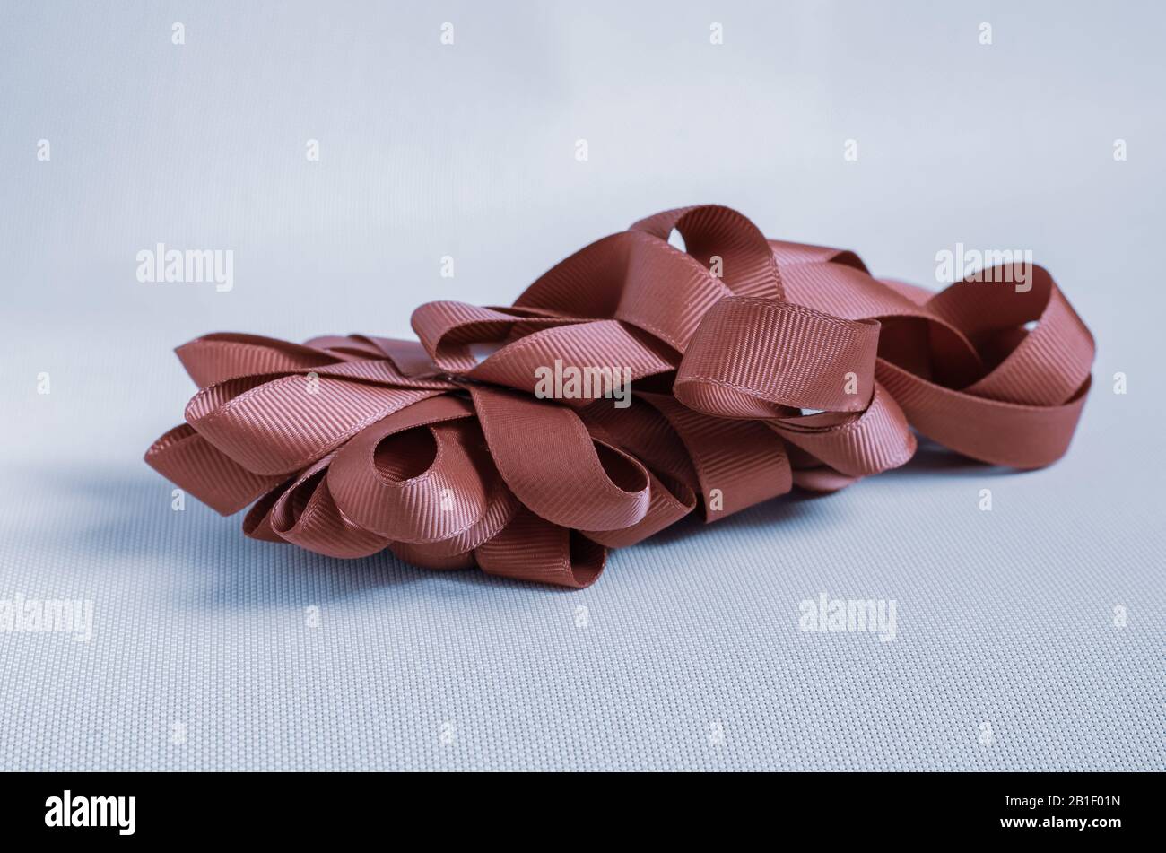 Abstract background of textile ribbon. Eye level shooting. Side view ...