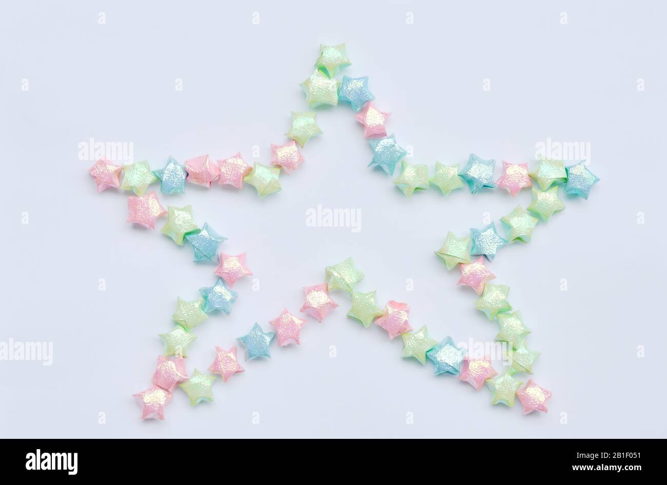 colorful star paper arranging in star shape on white background Stock ...