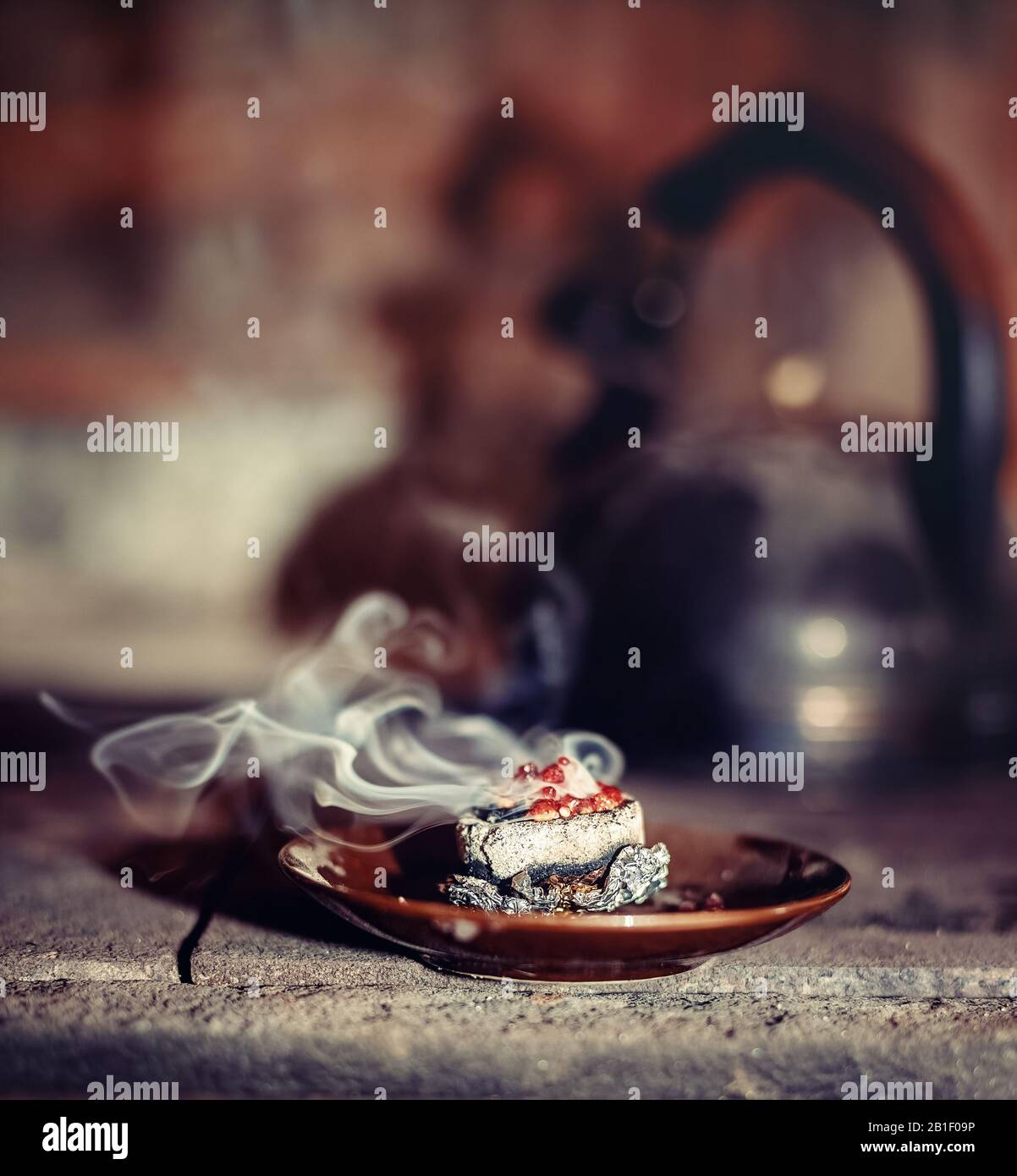 Frankincense burning on a hot coal. Aromatic frankincense Stock Photo ...