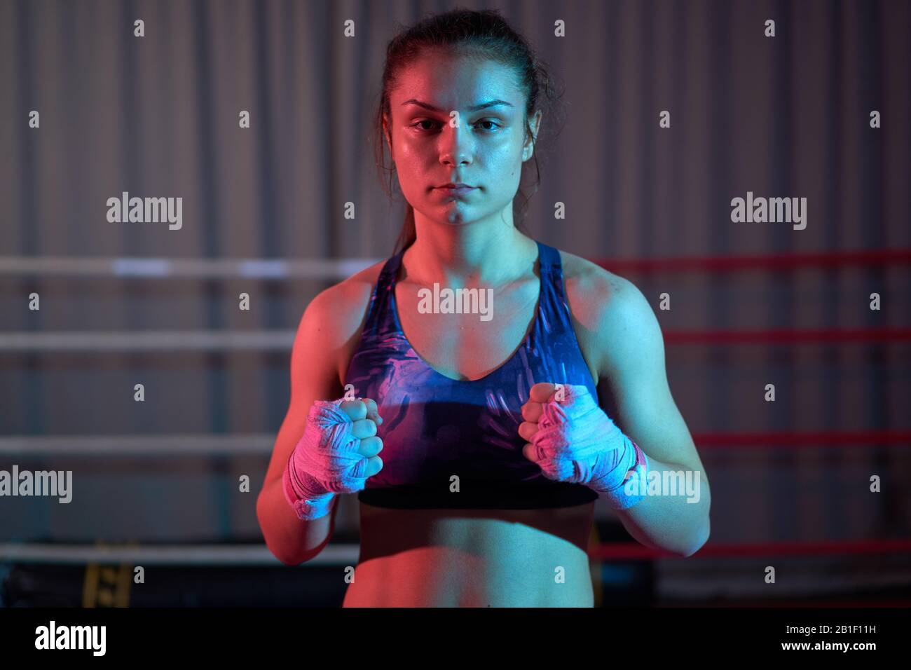 Kickboxer girl training in the ring Stock Photo - Alamy