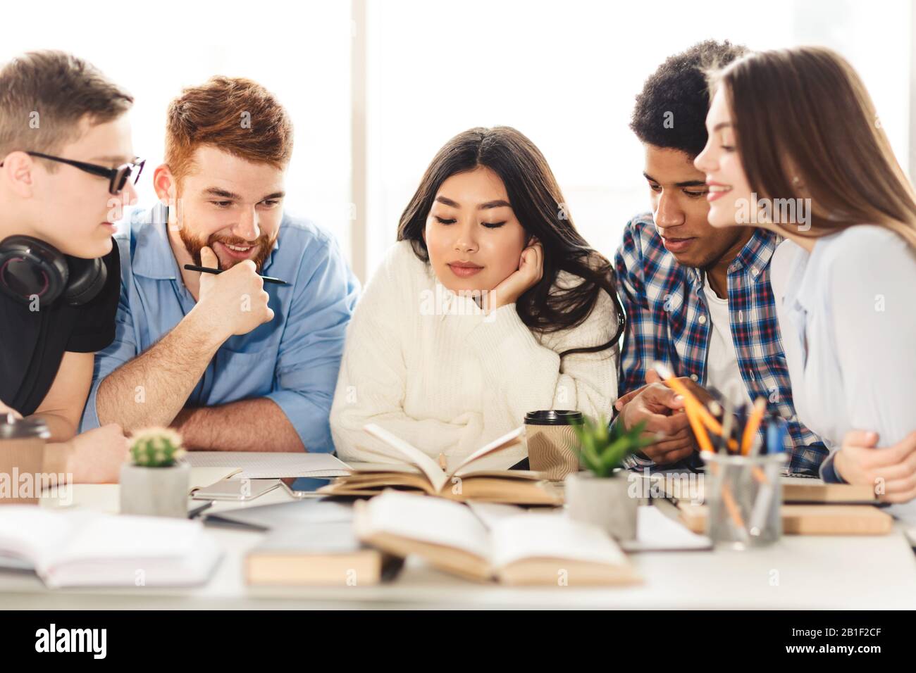 Learning concept. Multinational students preparing to exam Stock Photo ...